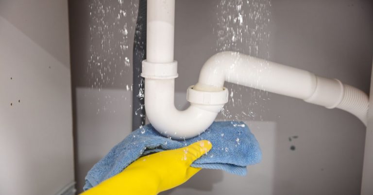 Kitchen Sink Leaking Underneath? Why & How to Fix It - Plumbing Sniper